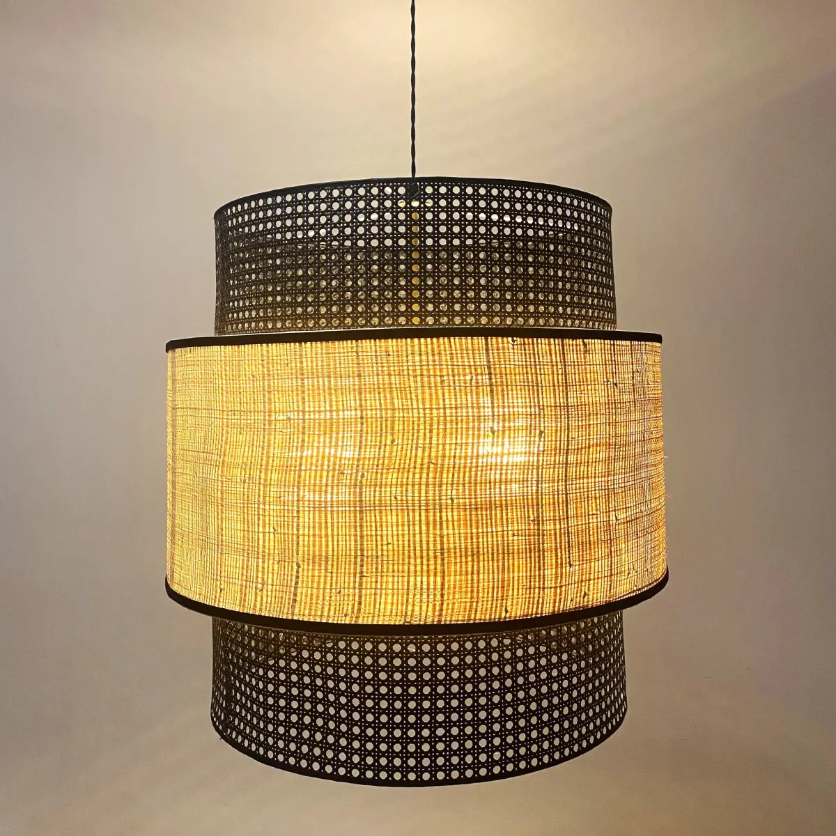 Rustic lamp with natural raffia lampshade and black grille